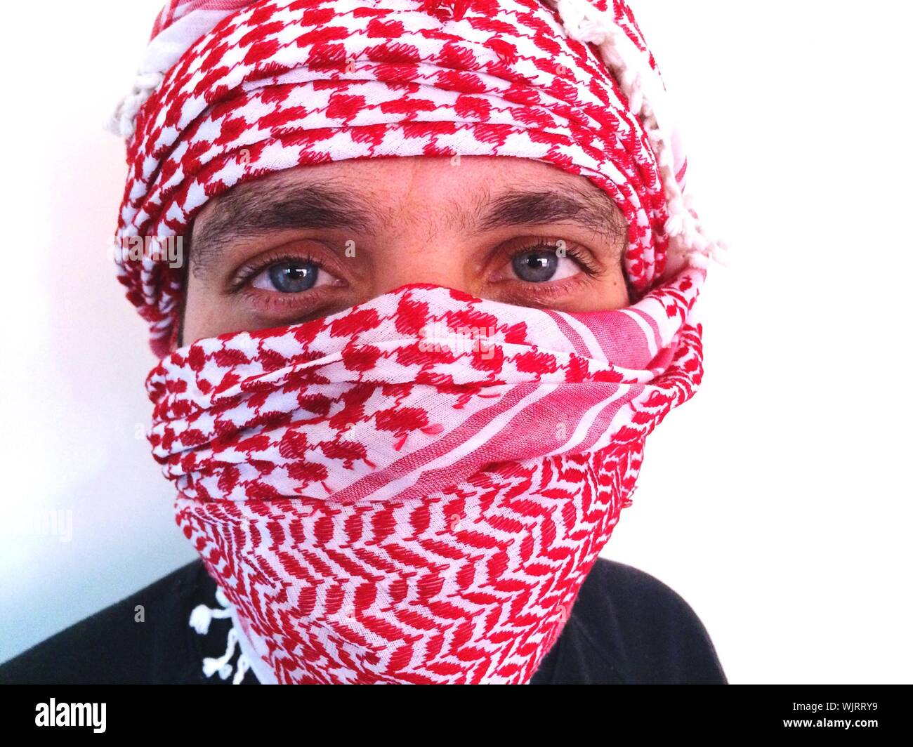Man covering face scarf hi-res stock photography and images - Alamy