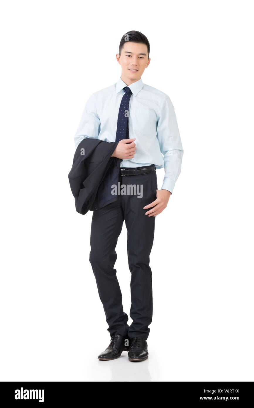Young Asian businessman hold coat and go off work, full length portrait ...