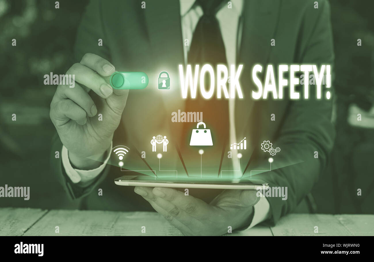 Writing note showing Work Safety. Business concept for policies and ...
