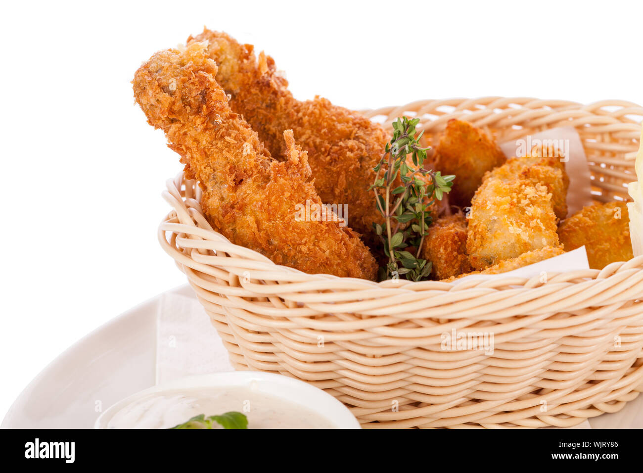 Crisp crunchy golden chicken legs and wings deep fried in bread crumbs ...