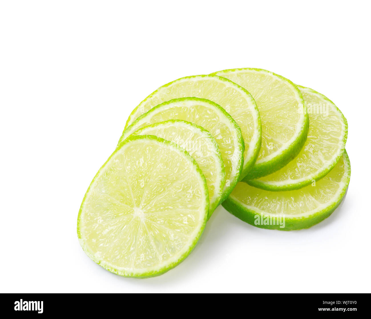 lime slices isolated on white background Stock Photo - Alamy