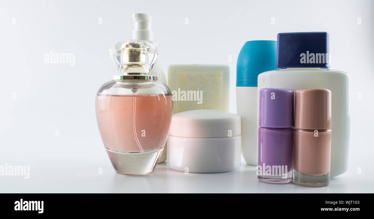Shampoo, sun cream, nail polish, parfum. Isolated on white background ...