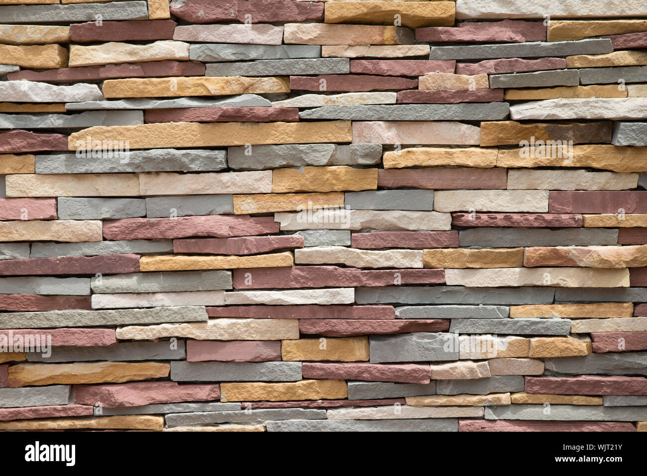 Modern stone brick wall background Stock Photo - Alamy
