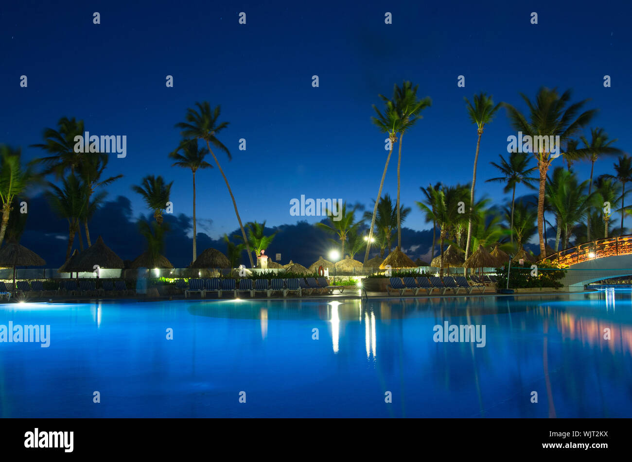 Swimming pool in night illumination Stock Photo - Alamy