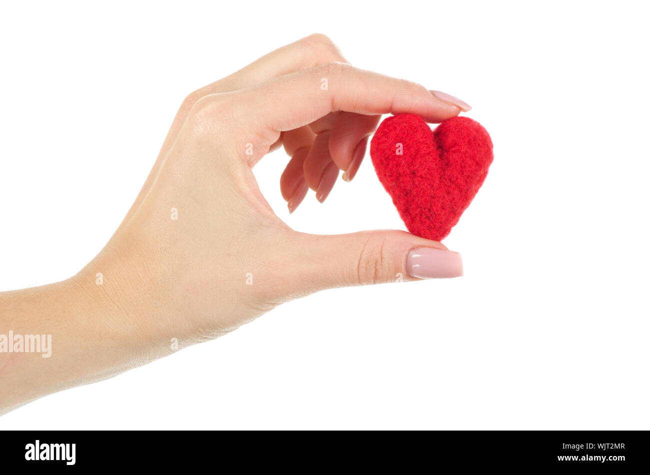 Hand holding the heart isolated on white background Stock Photo - Alamy