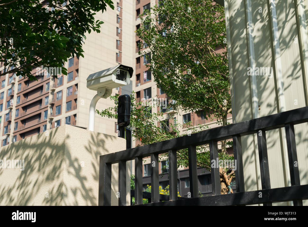 CCTV camera in front of a residential building Stock Photo - Alamy