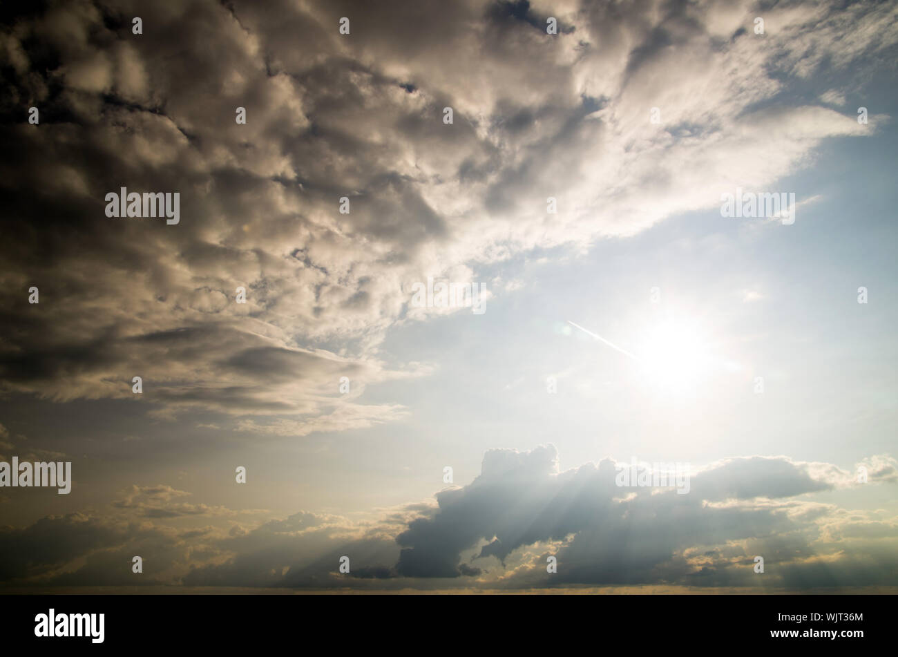sky with clouds and sun Stock Photo - Alamy