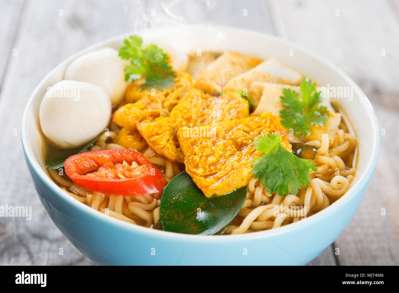 Close up spicy curry instant noodles. Asian cuisine, ready to serve on ...
