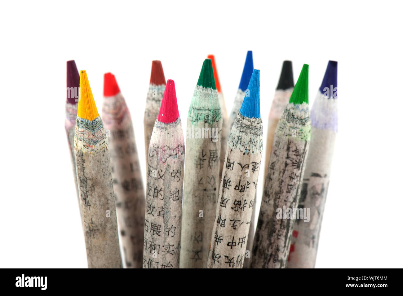 Chinese color pencils made from newspapers over white Stock Photo - Alamy