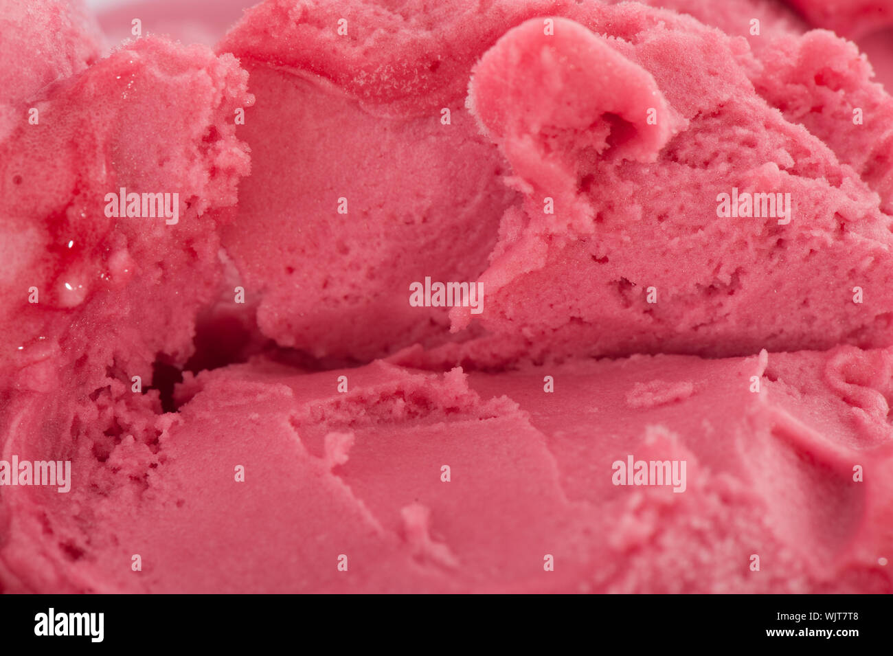 frozen cold strawberry ice cream in close up Stock Photo - Alamy