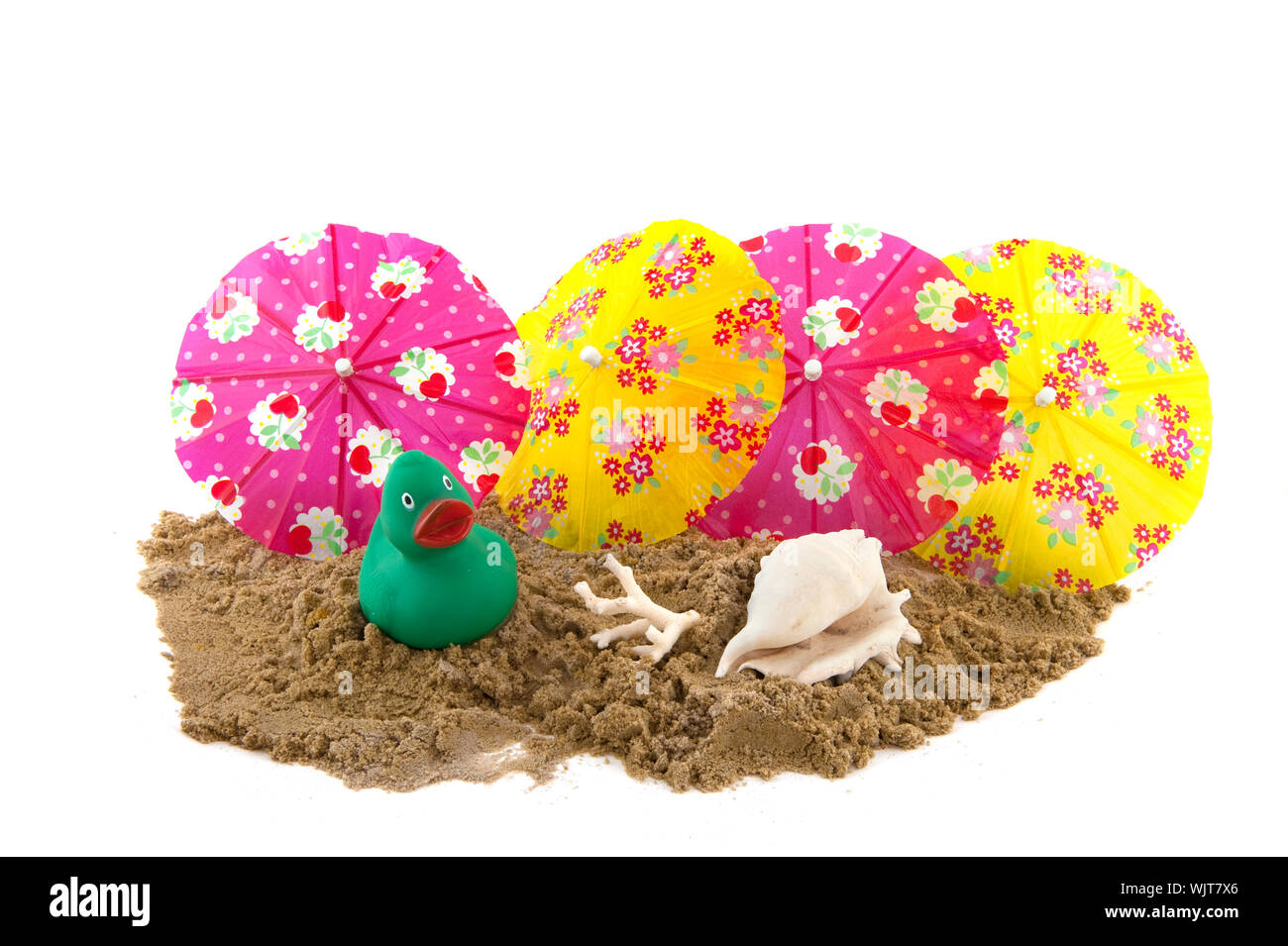 parasols at the beach with toys and shells Stock Photo - Alamy
