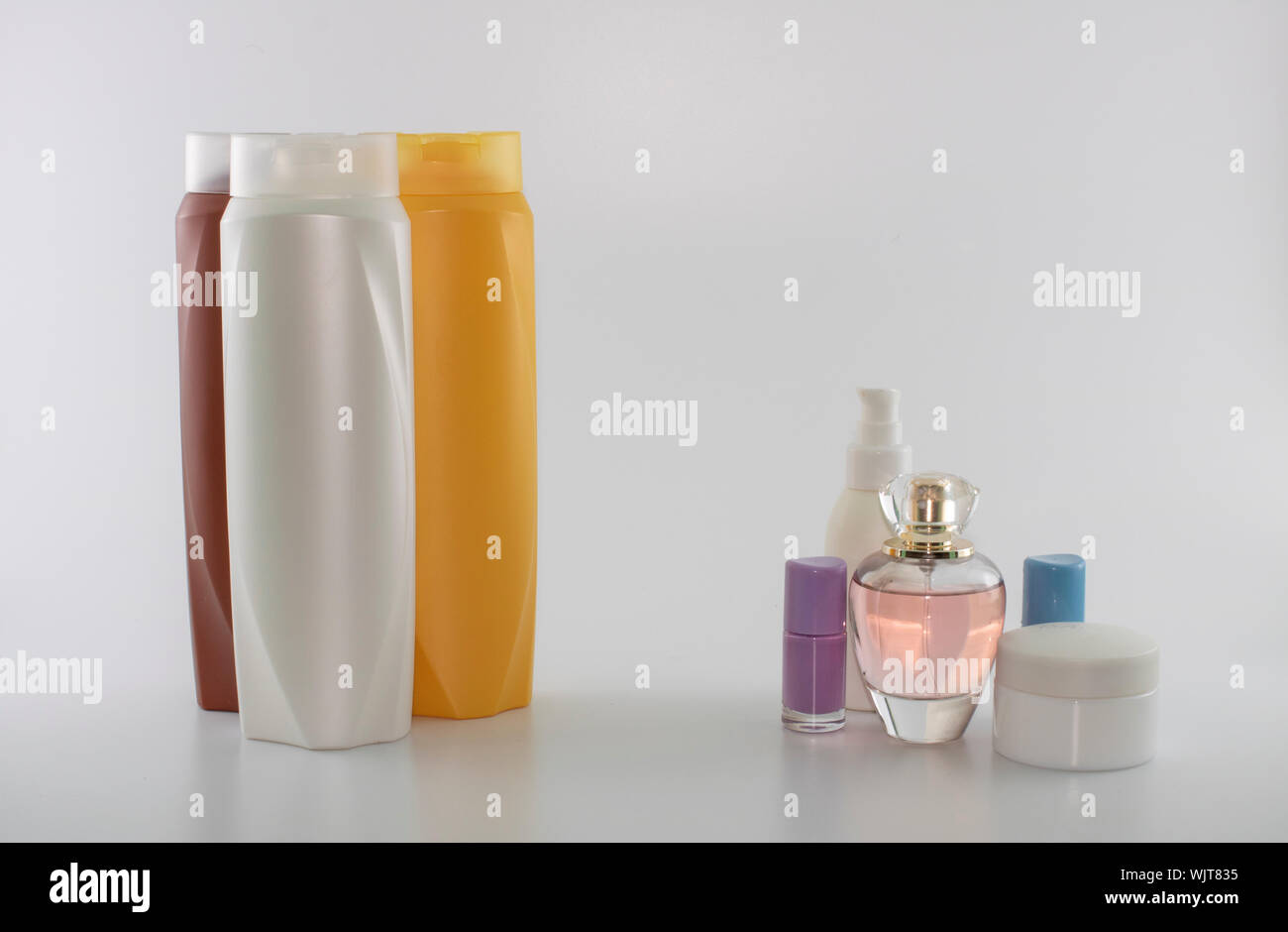 Shampoo, sun cream, nail polish, parfum. Isolated on white background ...