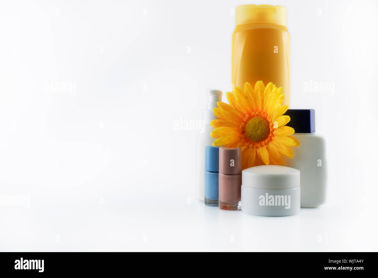 Shampoo, sun cream, nail polish, parfum. Isolated on white background ...