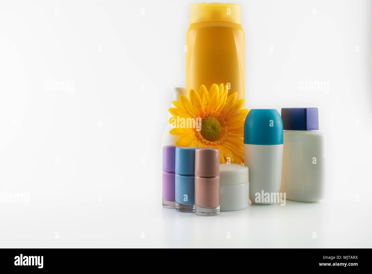 Shampoo, sun cream, nail polish, parfum. Isolated on white background ...