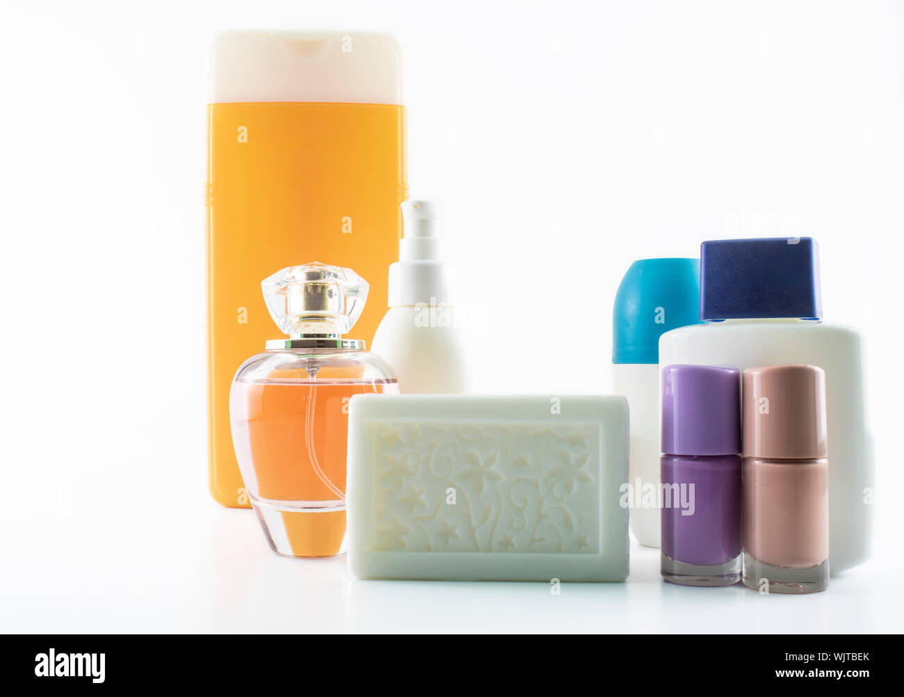 Shampoo, sun cream, nail polish, parfum. Isolated on white background ...