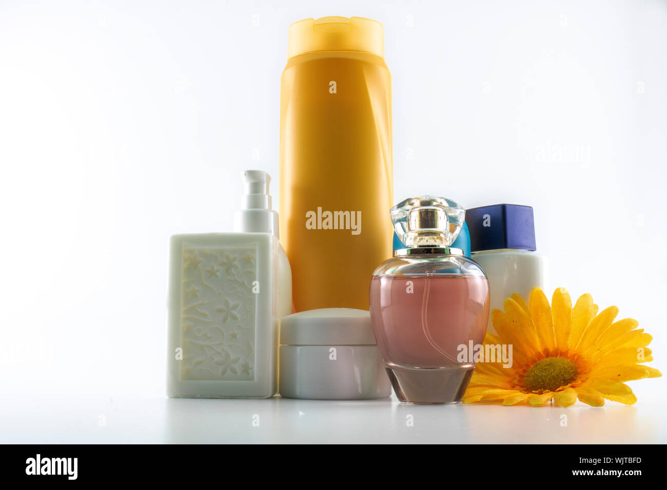 Shampoo, sun cream, nail polish, parfum. Isolated on white background ...