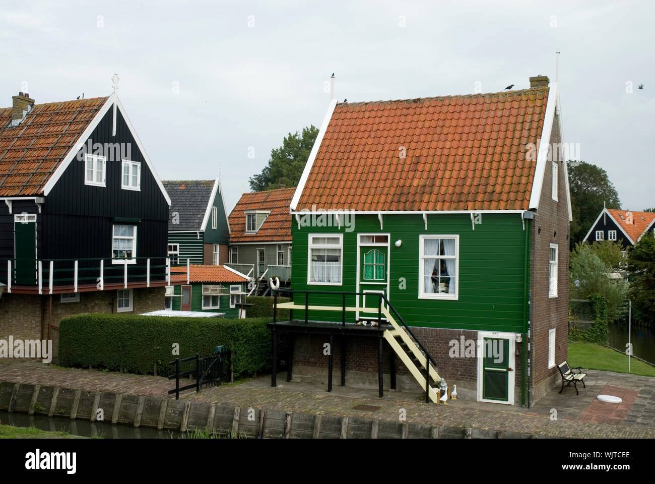 Typical Dutch village with wooden houses Stock Photo - Alamy