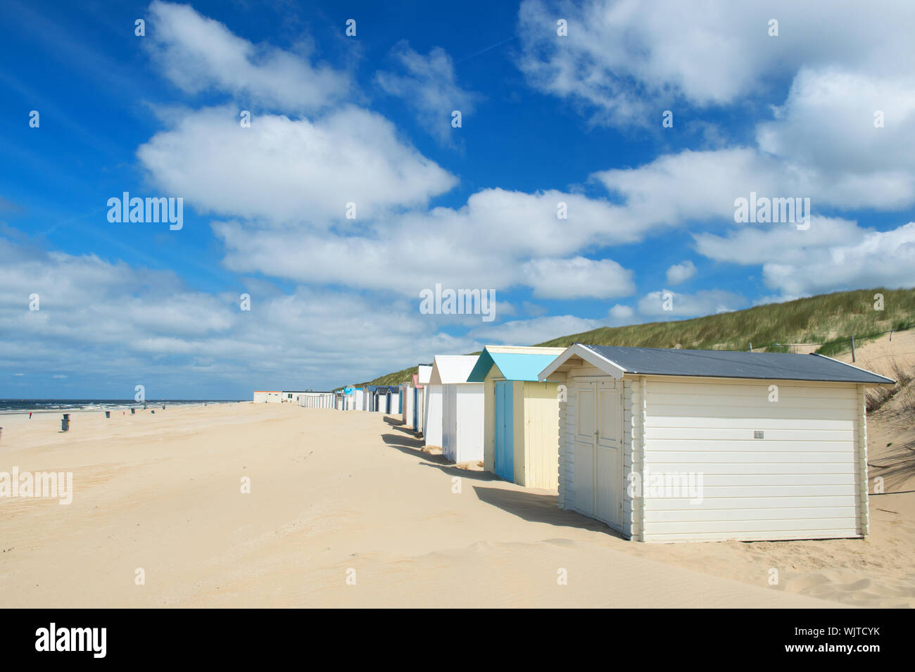 Row blue and white beach cabins for vacation surpose Stock Photo - Alamy