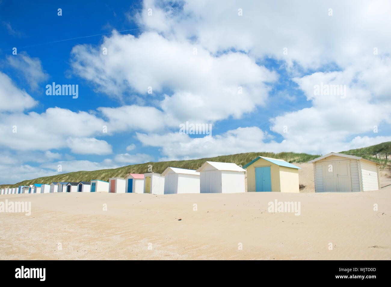 Row blue and white beach cabins for vacation surpose Stock Photo - Alamy