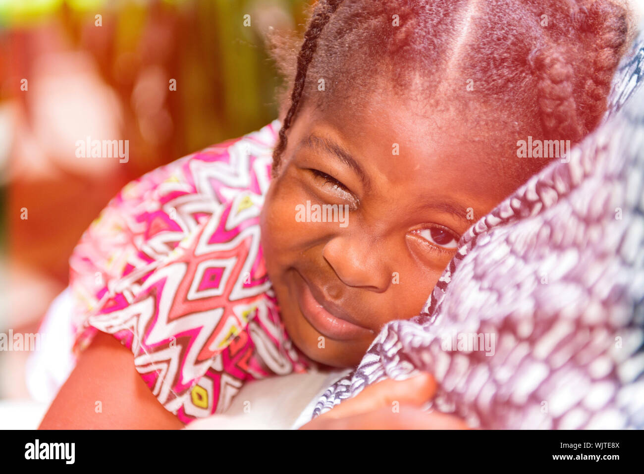 Girl winking close up hi-res stock photography and images - Alamy