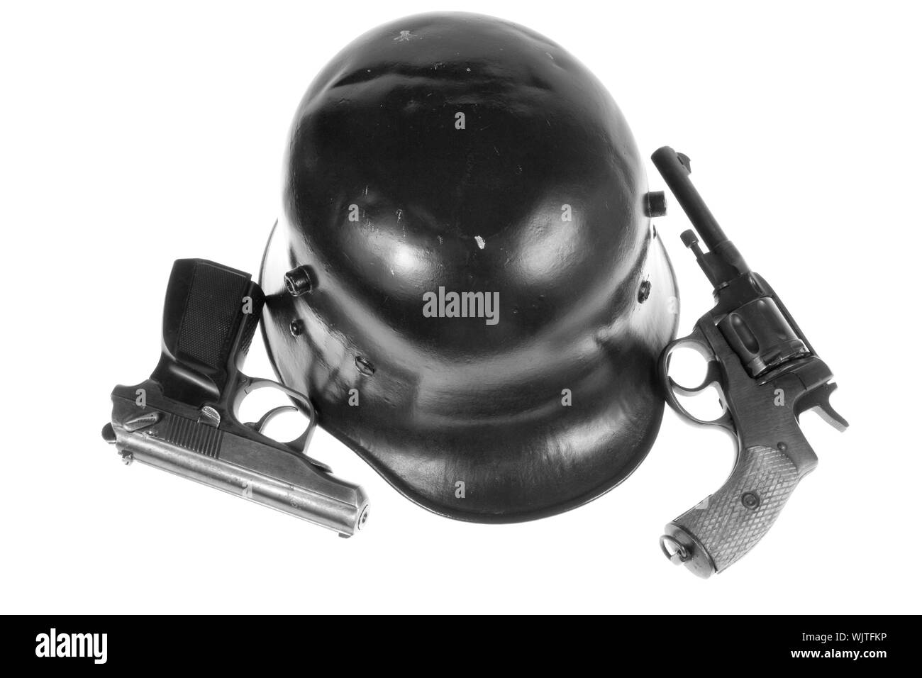 pistols and helmet isolated on white background Stock Photo - Alamy