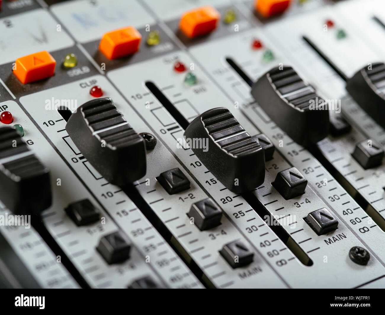 Macro photo of faders of a studio soundboard Stock Photo - Alamy