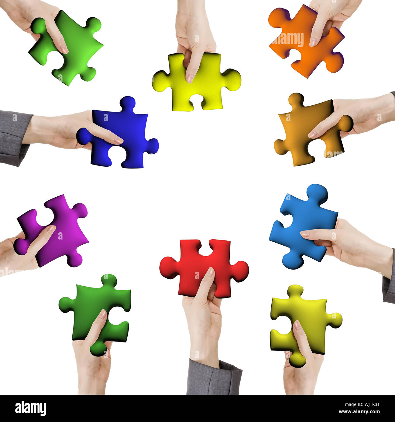 Concept of help or working together, hands holding various color puzzle ...