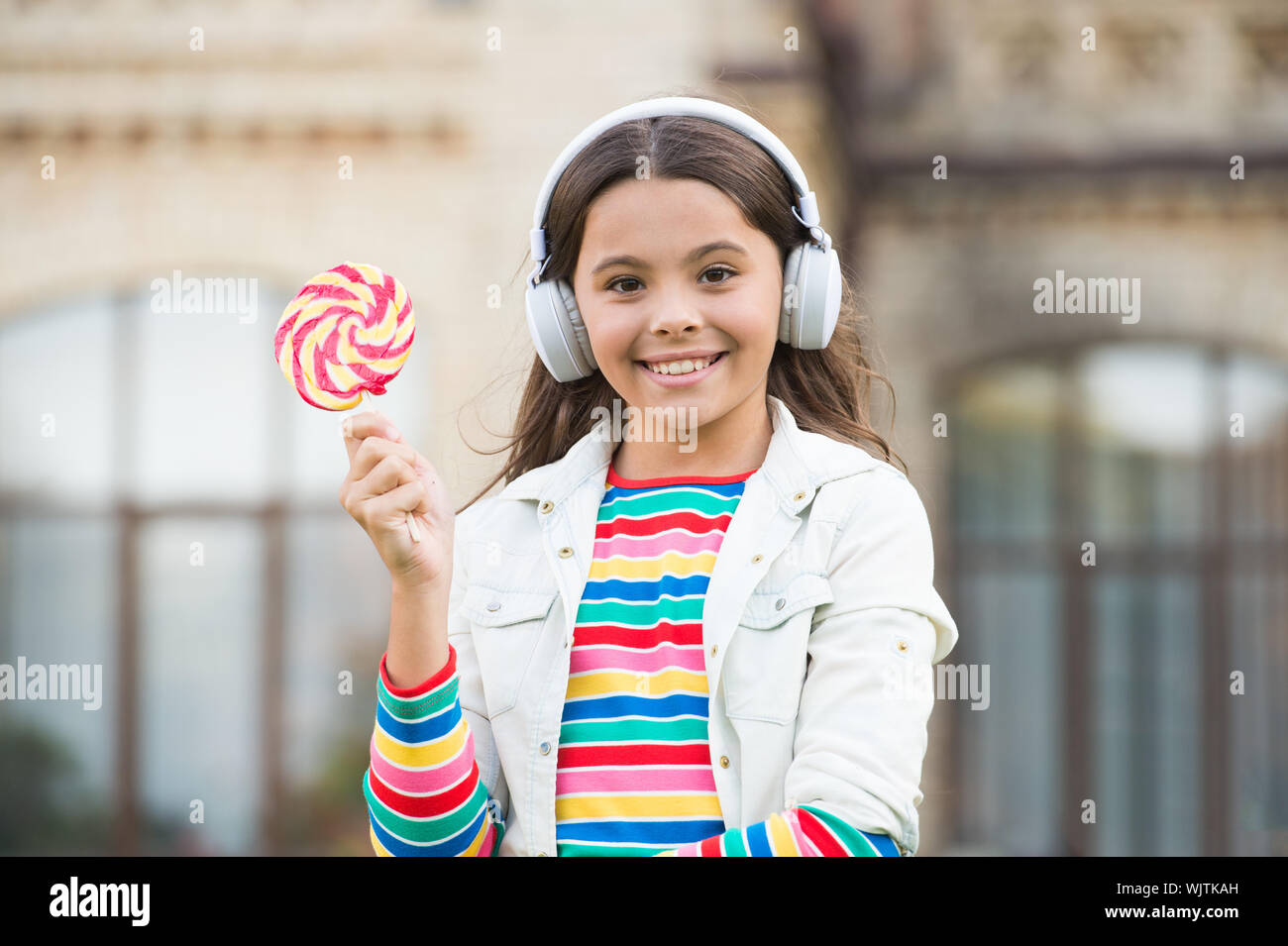 Happy kid singing sweet candy mic. Happy childhood. Kid child ...