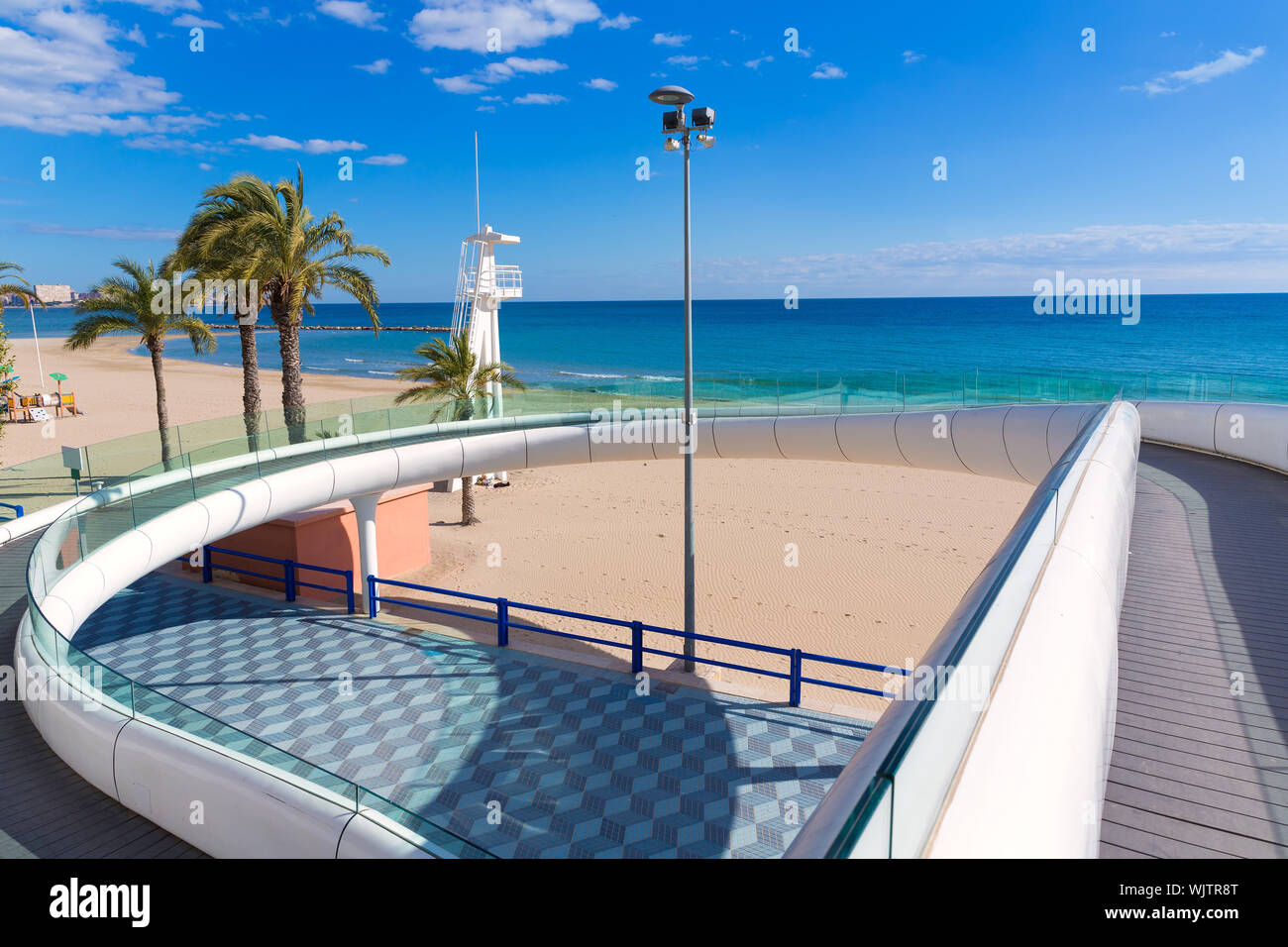 Alicante el Postiguet beach playa with modern pedestrian white bridge ...