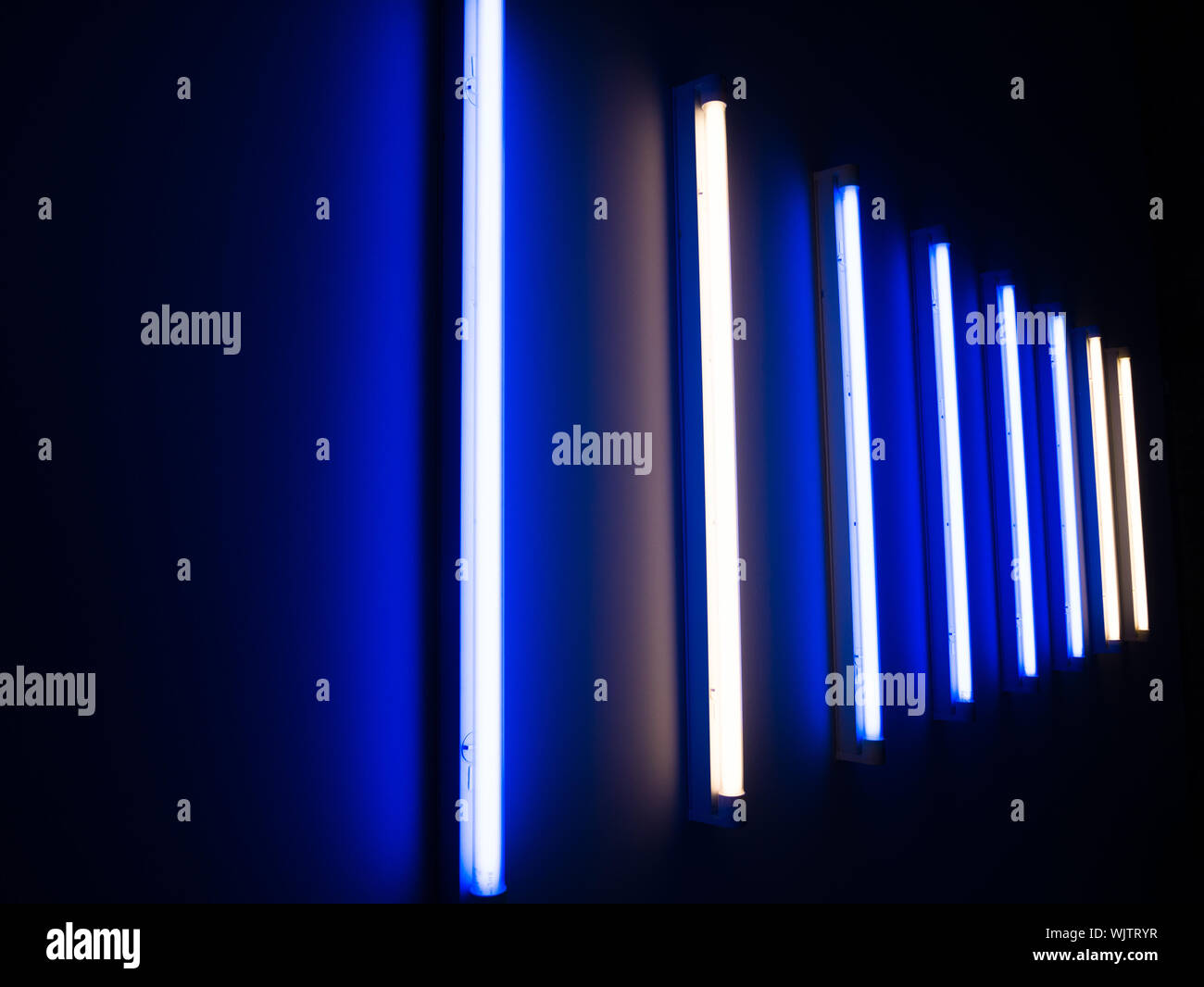 Blue Wall With A Row Of Wall Lights High Resolution Stock Photography ...