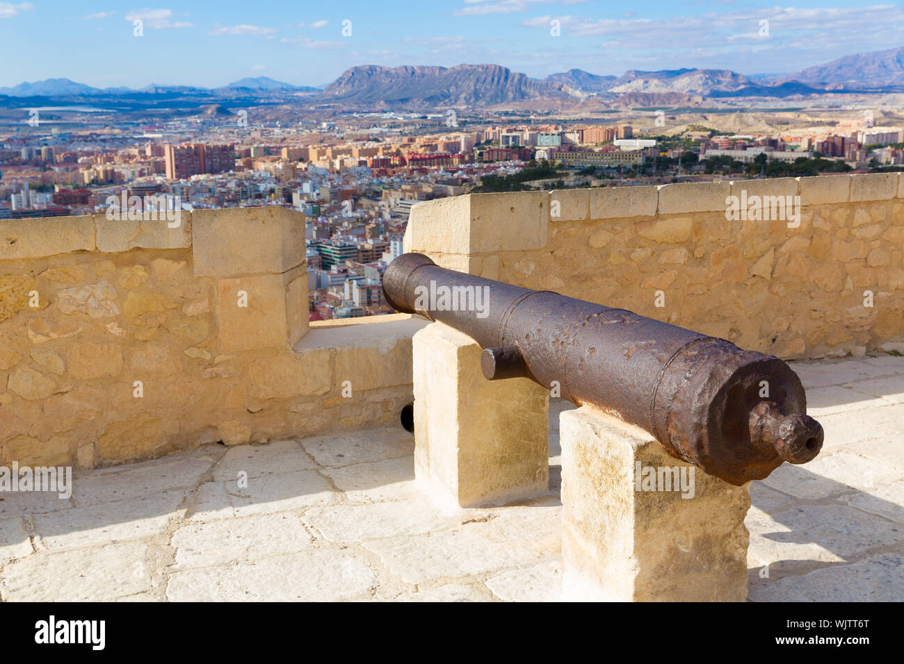 Alicante skyline and old canyons of Santa Barbara Castle in Spain Stock ...