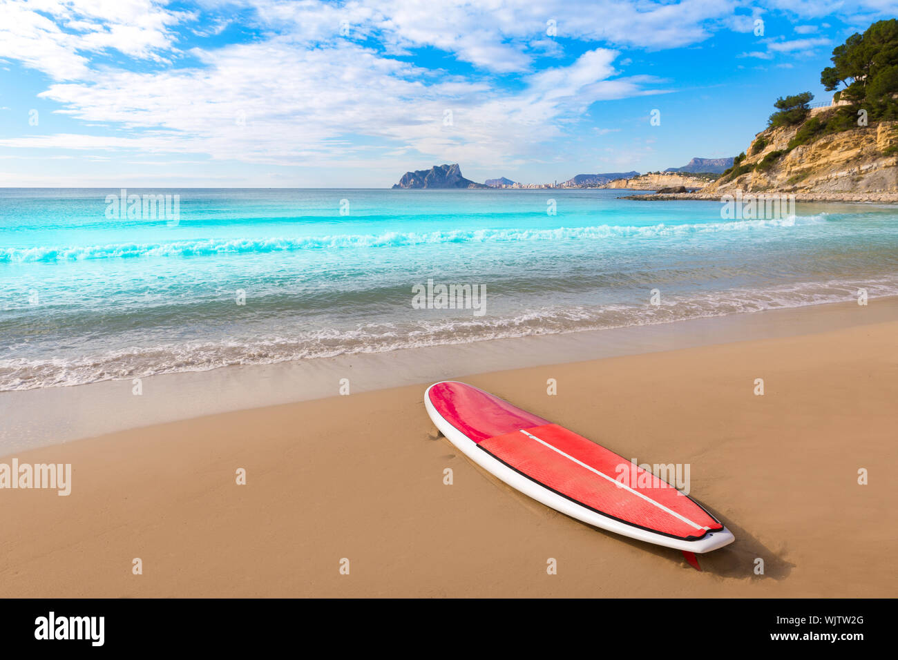 Moraira playa El Portet beach with paddle surfboard at Alicante Spain ...