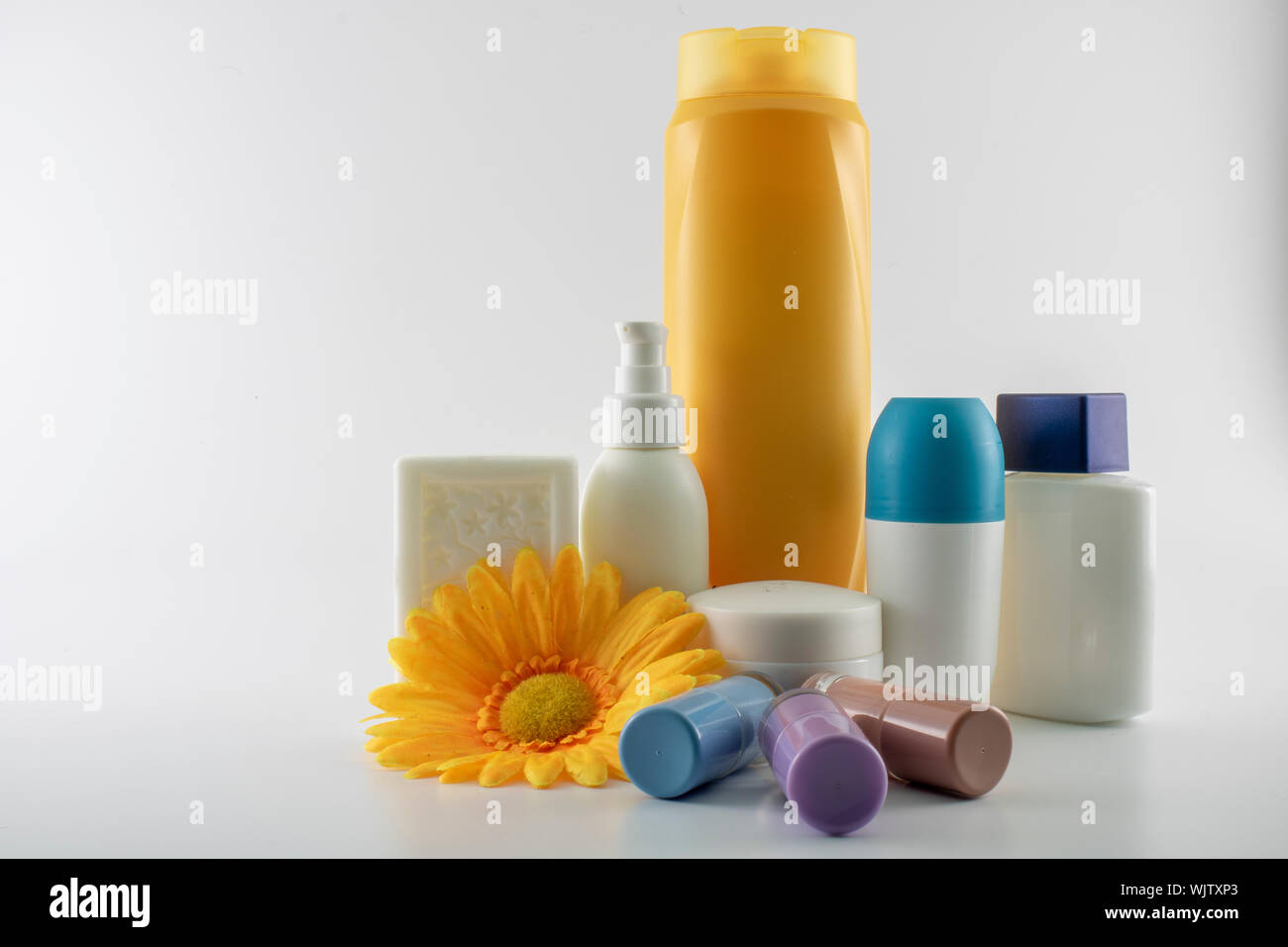 Set consisting of sun cream, parfum, nail polish, lotion. isolated ...