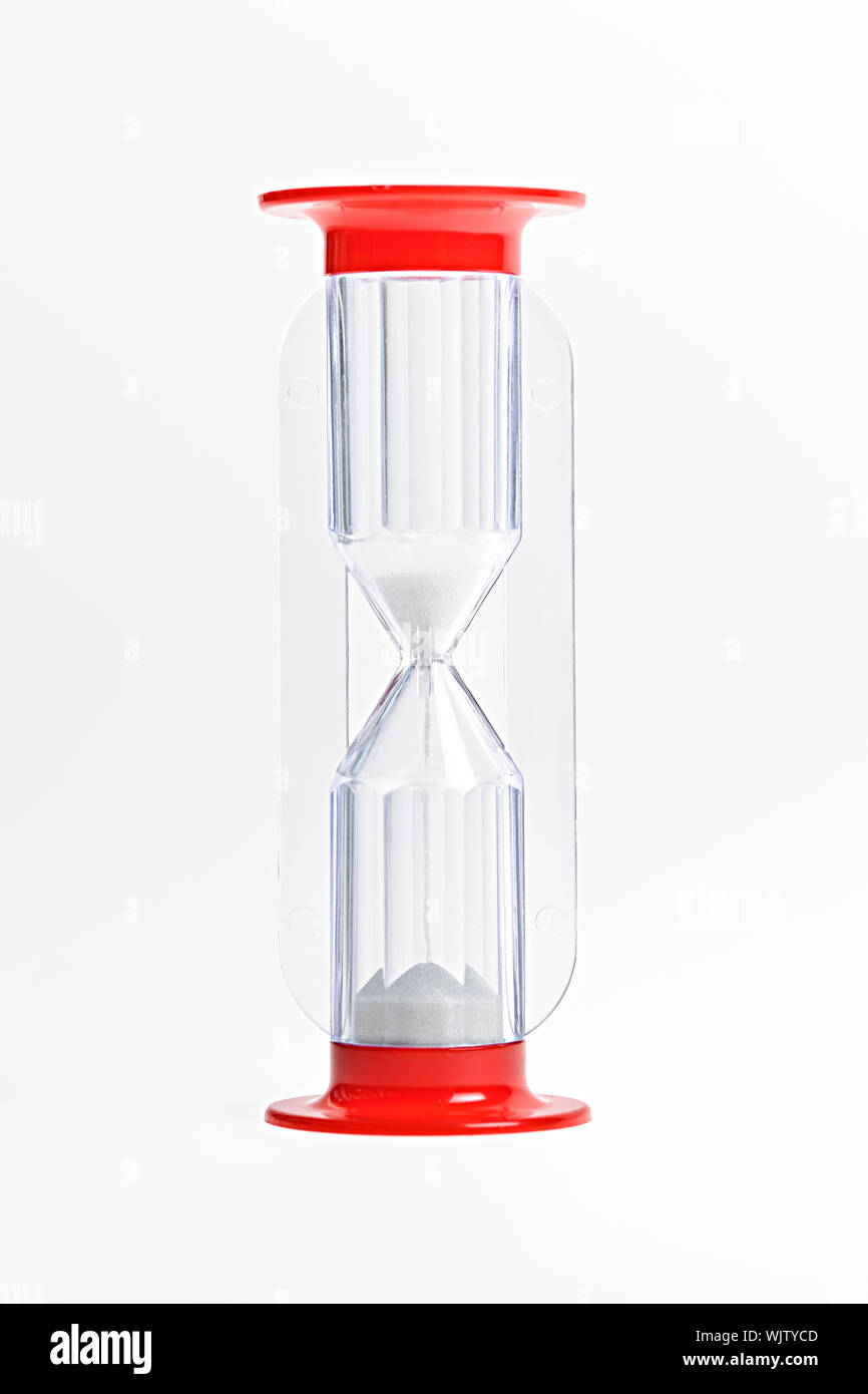 Hourglass of glass and red plastic isolated on white background Stock ...