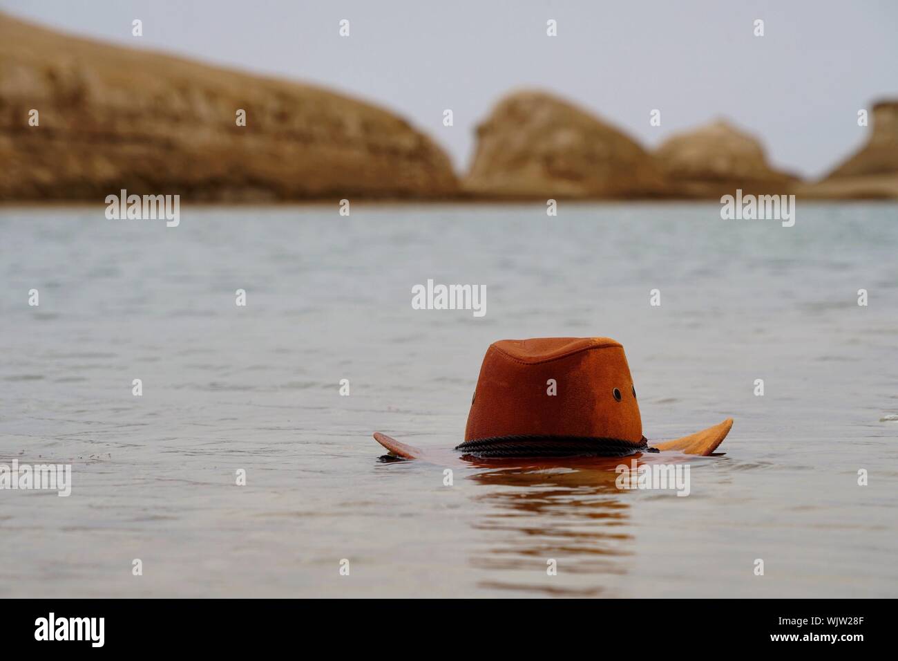 Hat floating on water hi-res stock photography and images - Alamy