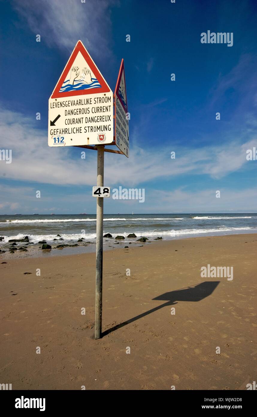 Swimming restriction sign on a Dutch beach in summer Stock Photo - Alamy