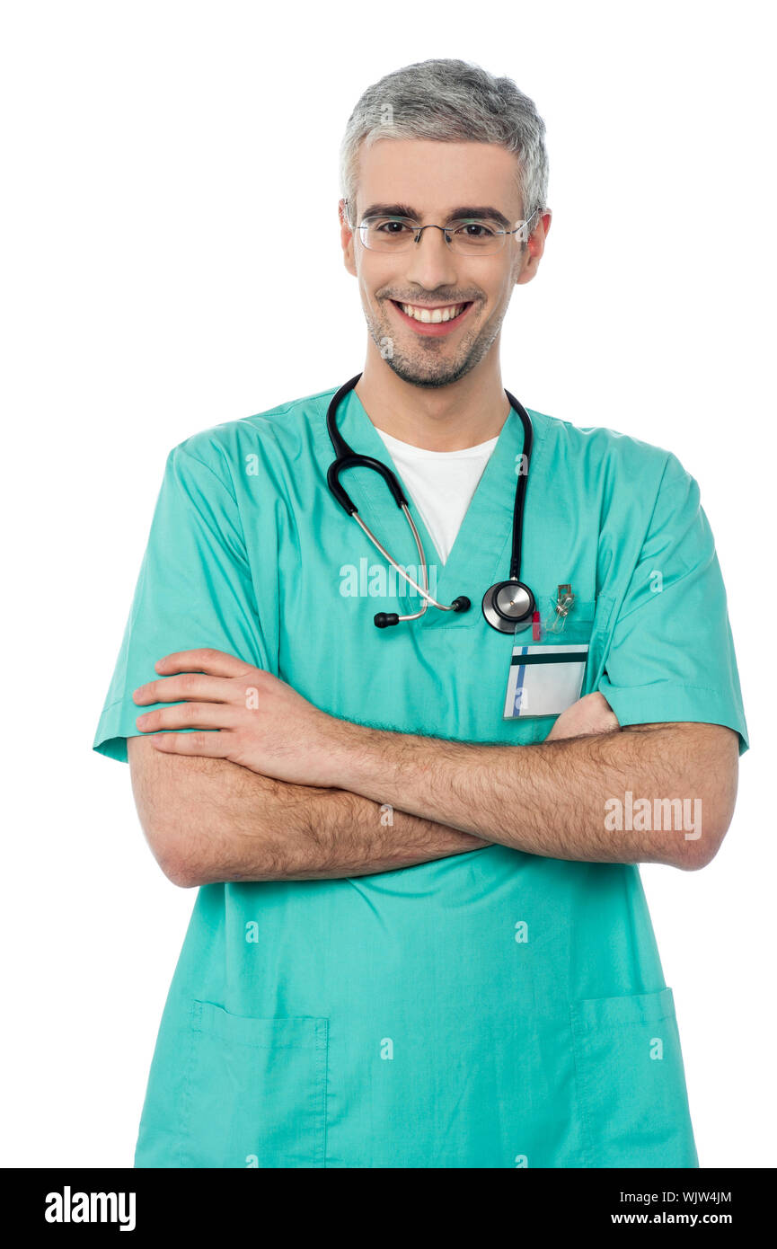 Senior doctor standing hands folded hi-res stock photography and images ...