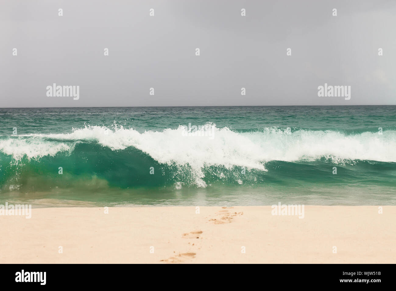 Big waves in rough seas Stock Photo - Alamy