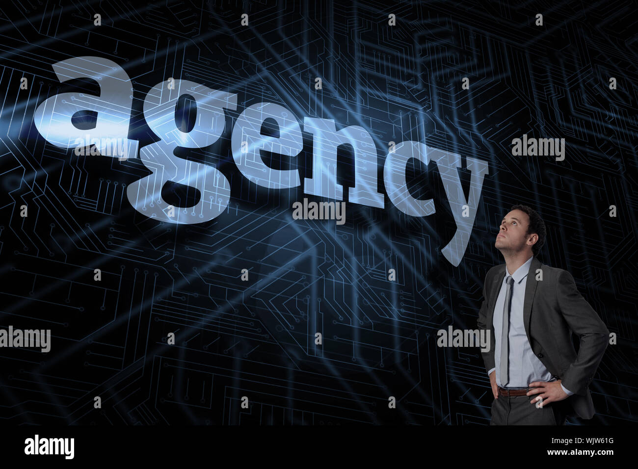 The word agency and serious businessman with hands on hips against ...