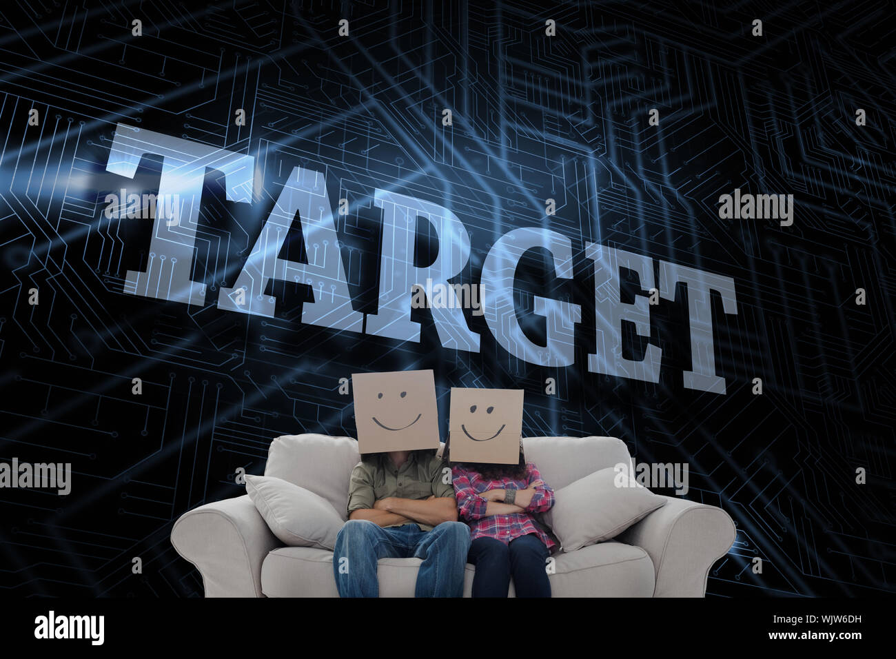 The word target and silly employees with arms folded wearing boxes on ...