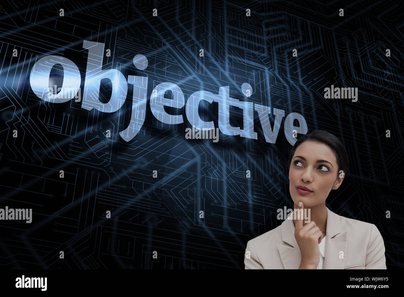 The word objective and smiling businesswoman thinking against ...