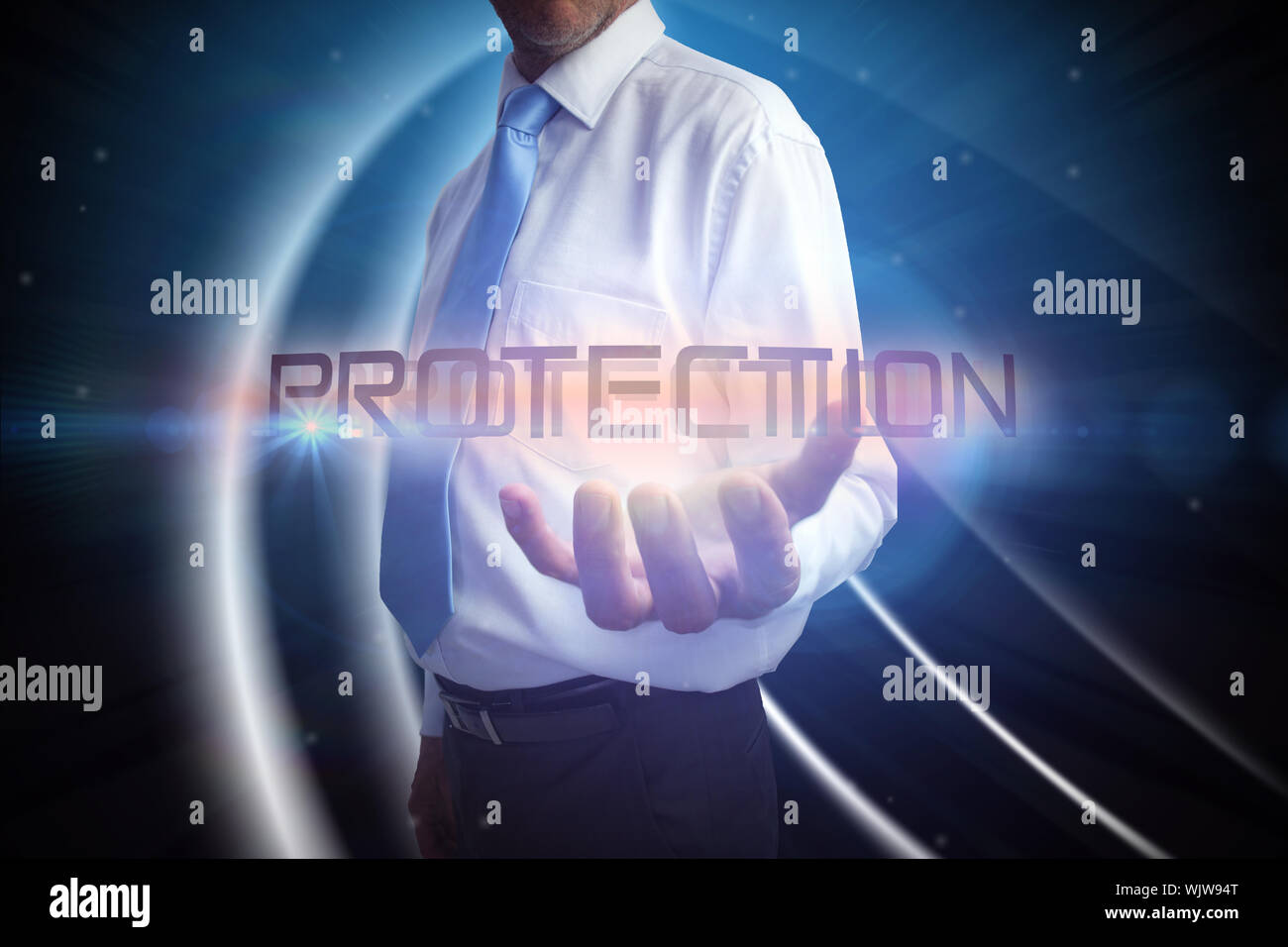 Businessman presenting the word protection against black background ...