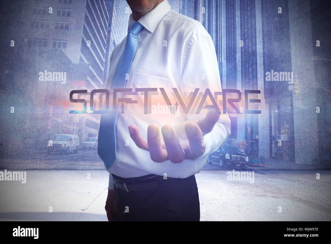 Businessman presenting the word software against urban projection on ...