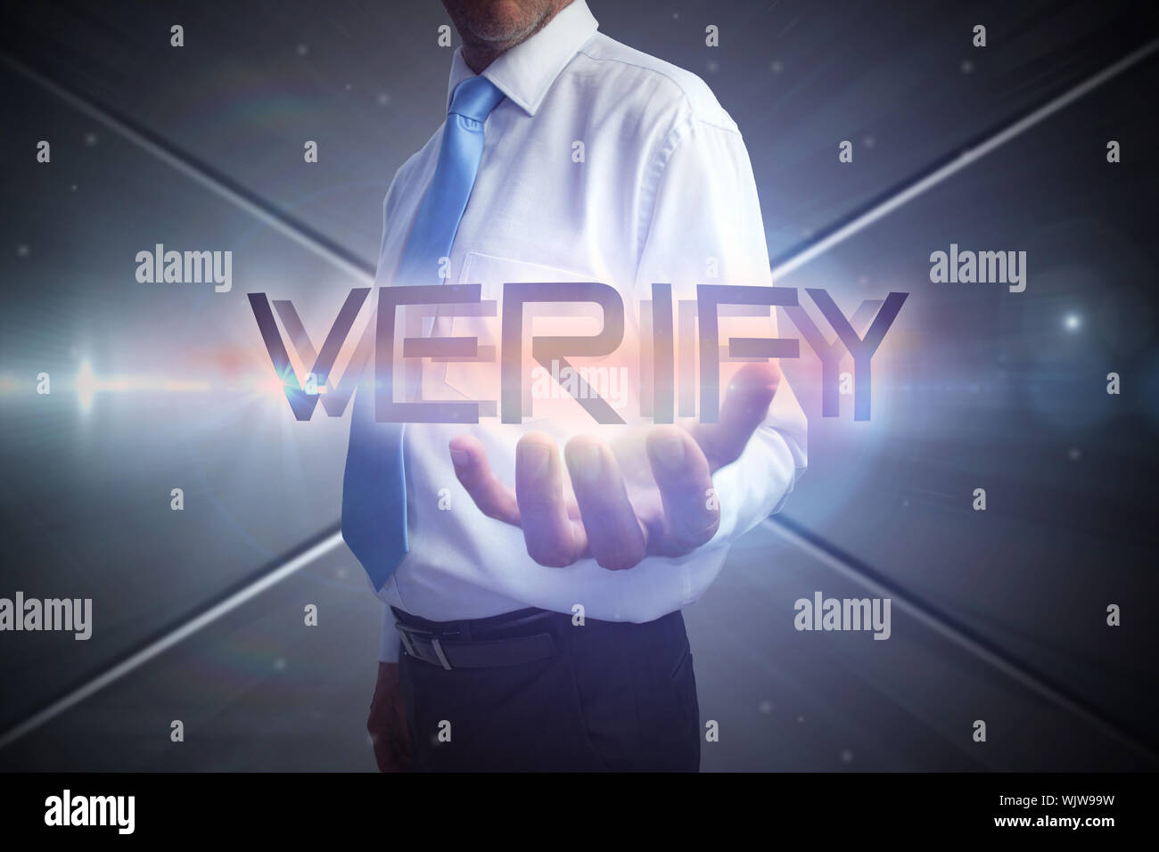 Businessman presenting the word verify against futuristic screen with ...