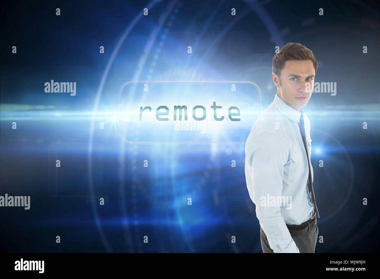 The word remote and serious businessman with hand in pocket against ...
