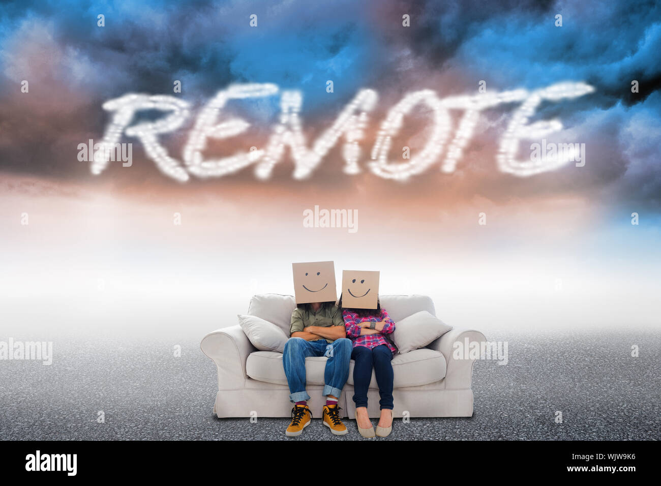 The word remote and silly employees with arms folded wearing boxes on ...