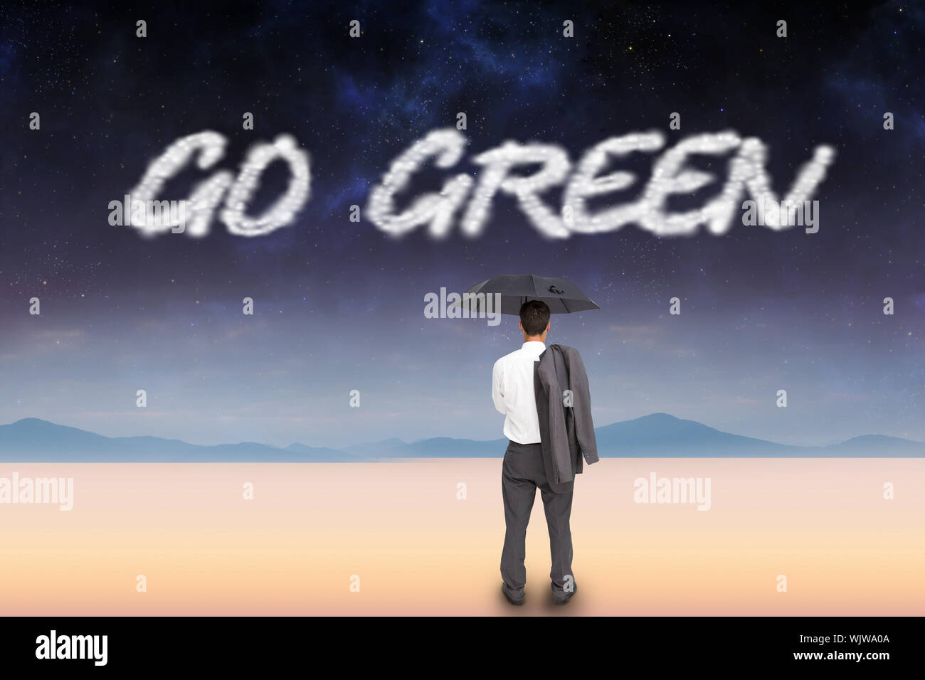 The word go green against bright blue sky with cloud Stock Photo - Alamy