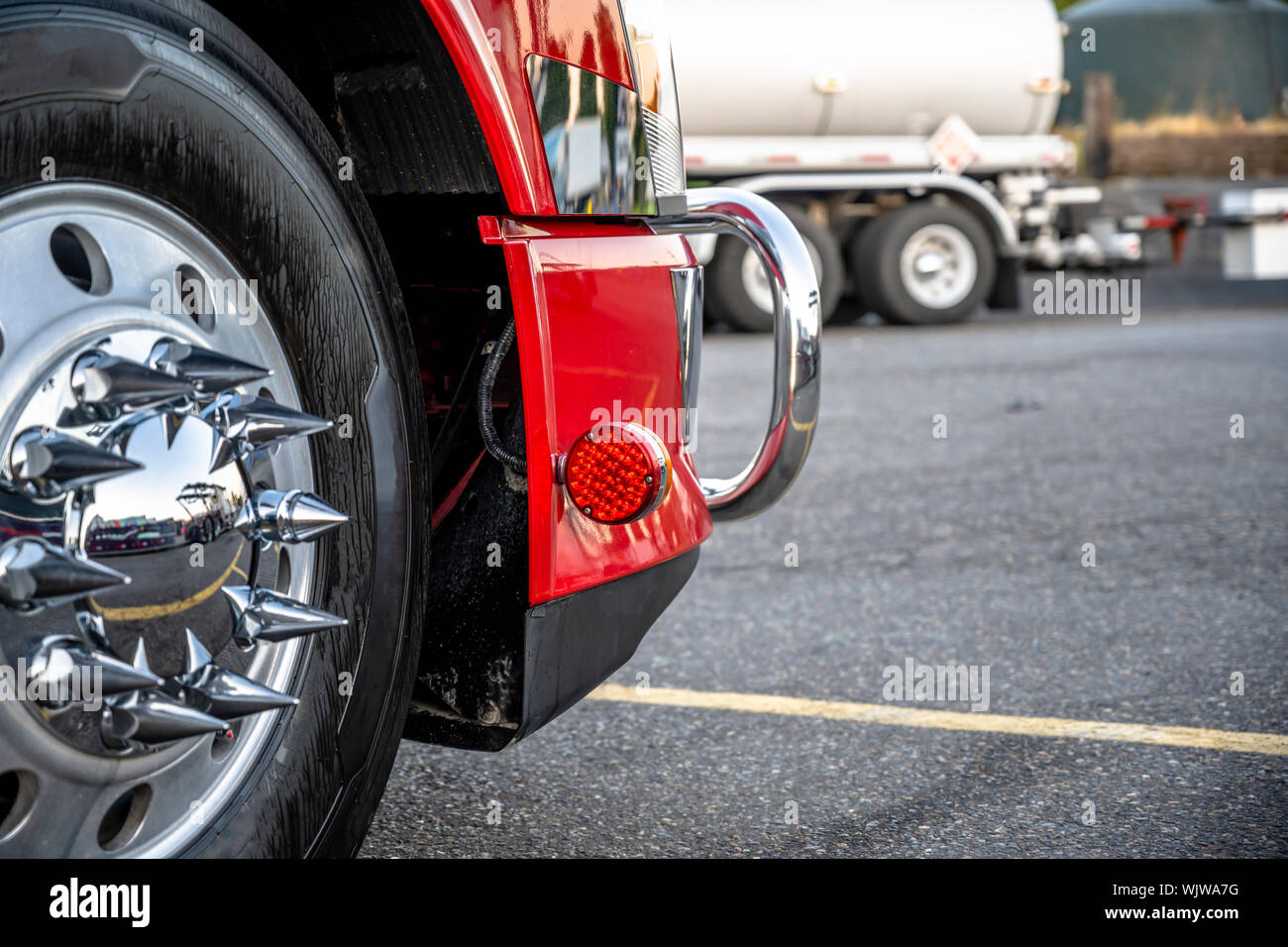 Big rig red heavy-duty powerful semi truck wheel with aluminum rim and ...