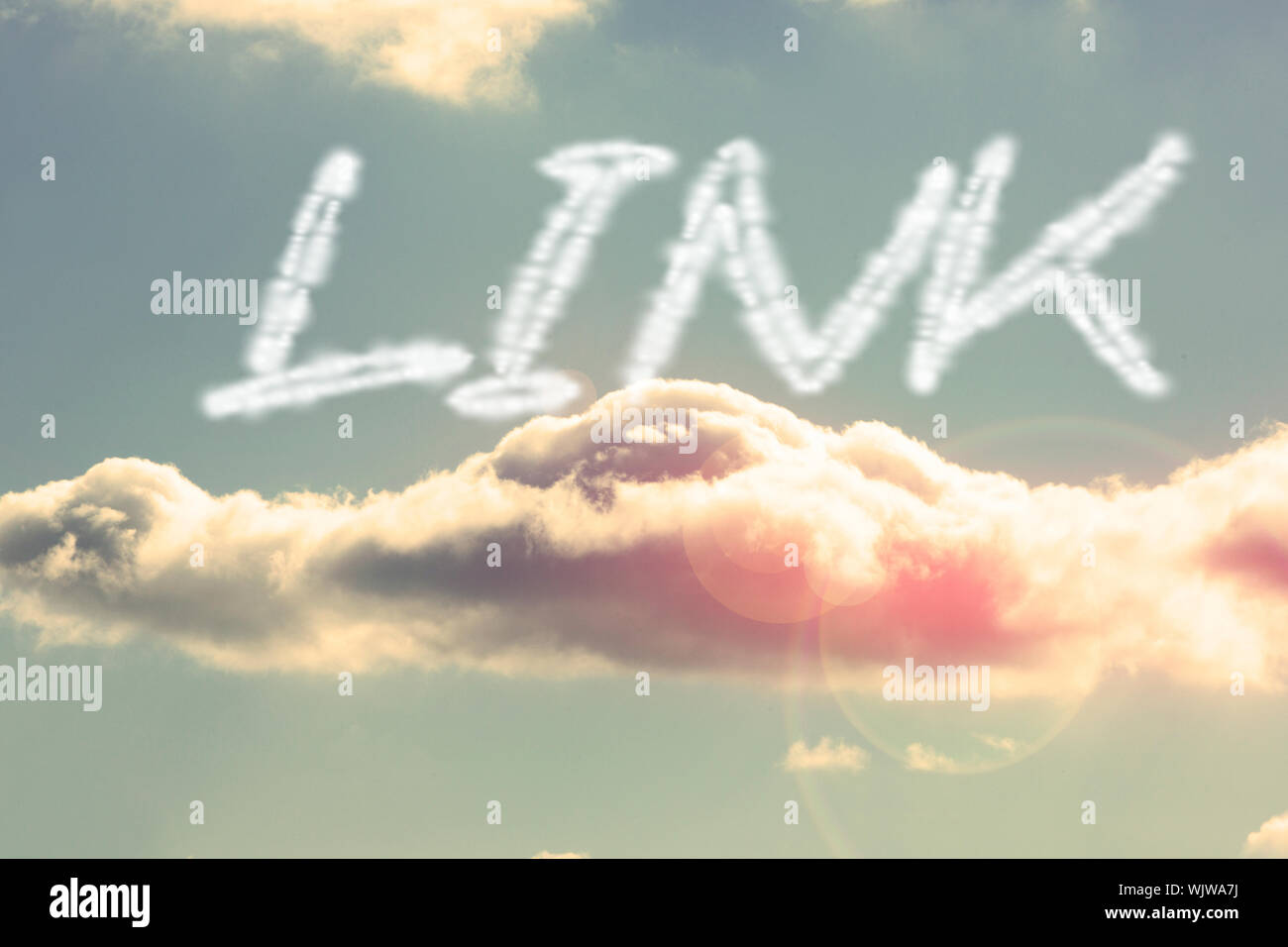 The word link against bright blue sky with cloud Stock Photo - Alamy