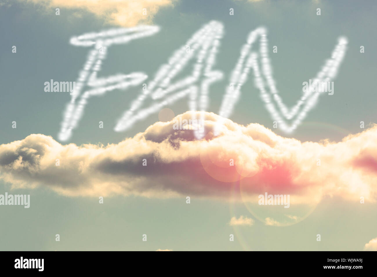 The word fan against bright blue sky with cloud Stock Photo - Alamy
